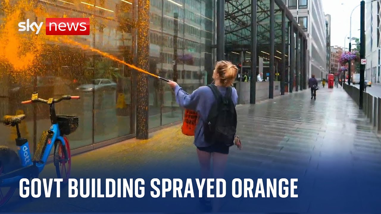 Just Stop Oil: Protesters spray orange paint over Department for Energy ...