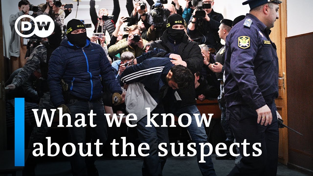 Moscow terror suspects in court, Putin links attack to Ukraine | DW ...