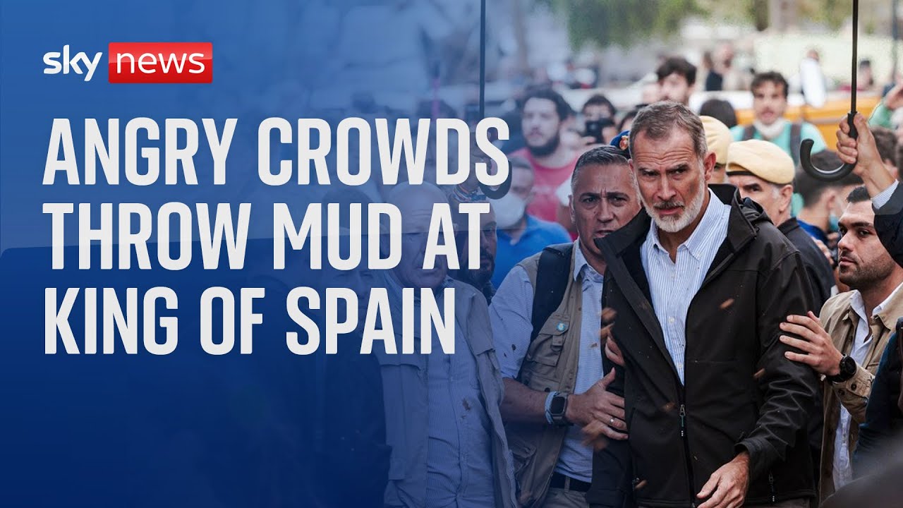 Angry crowds hurl mud and insults at King of Spain as he visits town ...